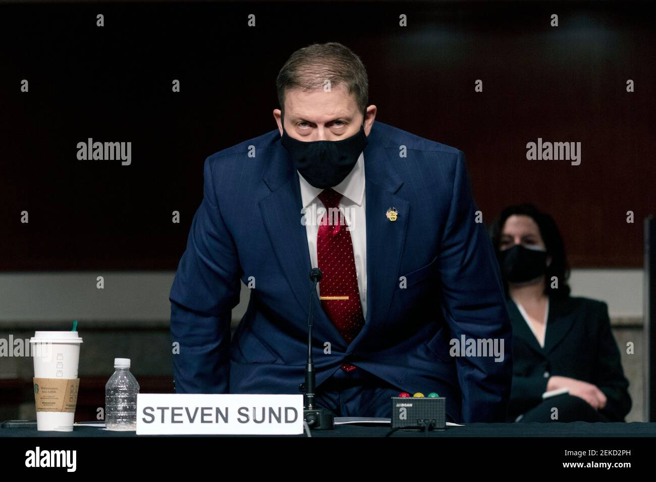 Former U.S. Capitol Police Chief Steven Sund sits down after being ...