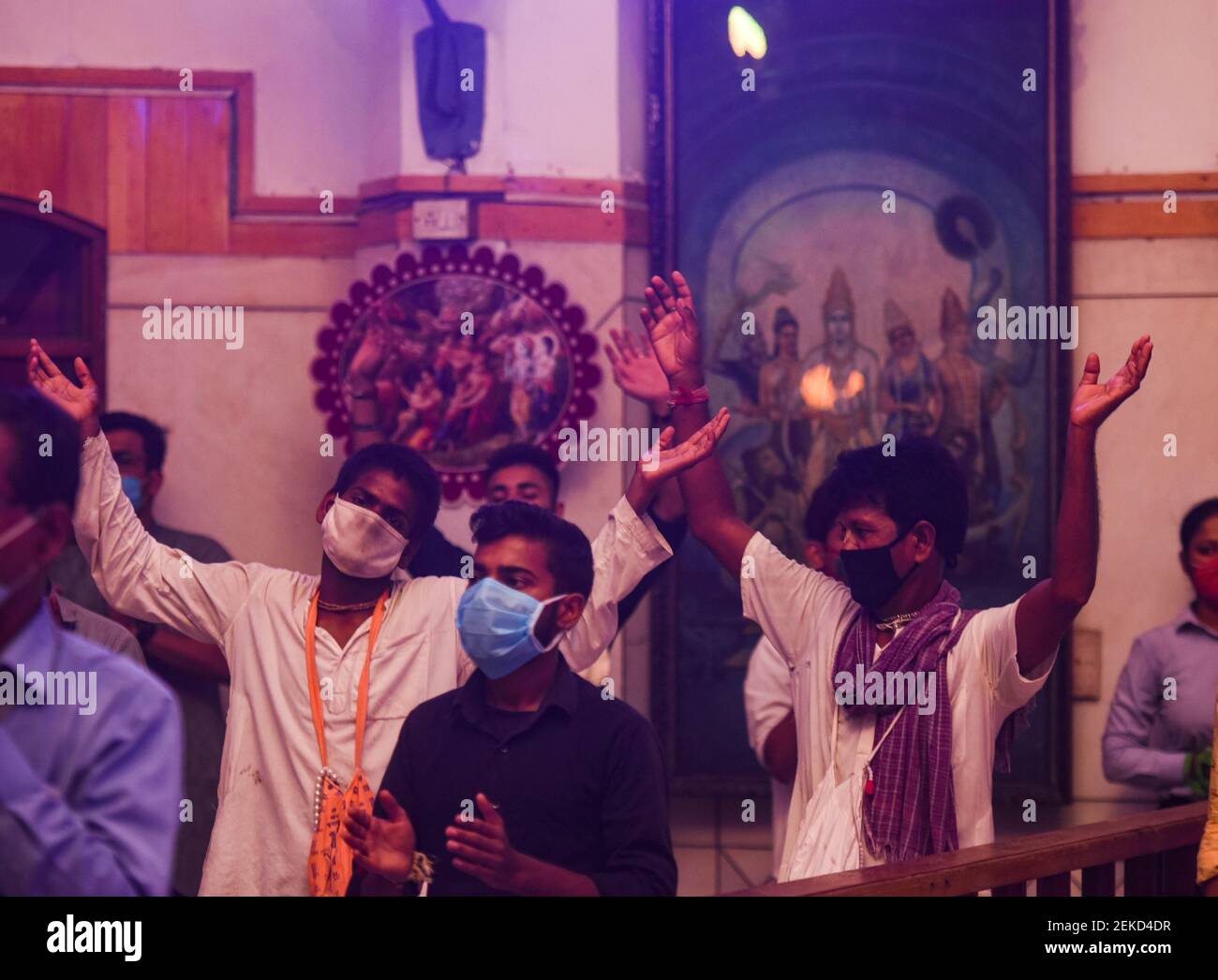 NEW DELHI, INDIA - AUGUST 11: Devotees offer prayers to Lord Krishna at ...