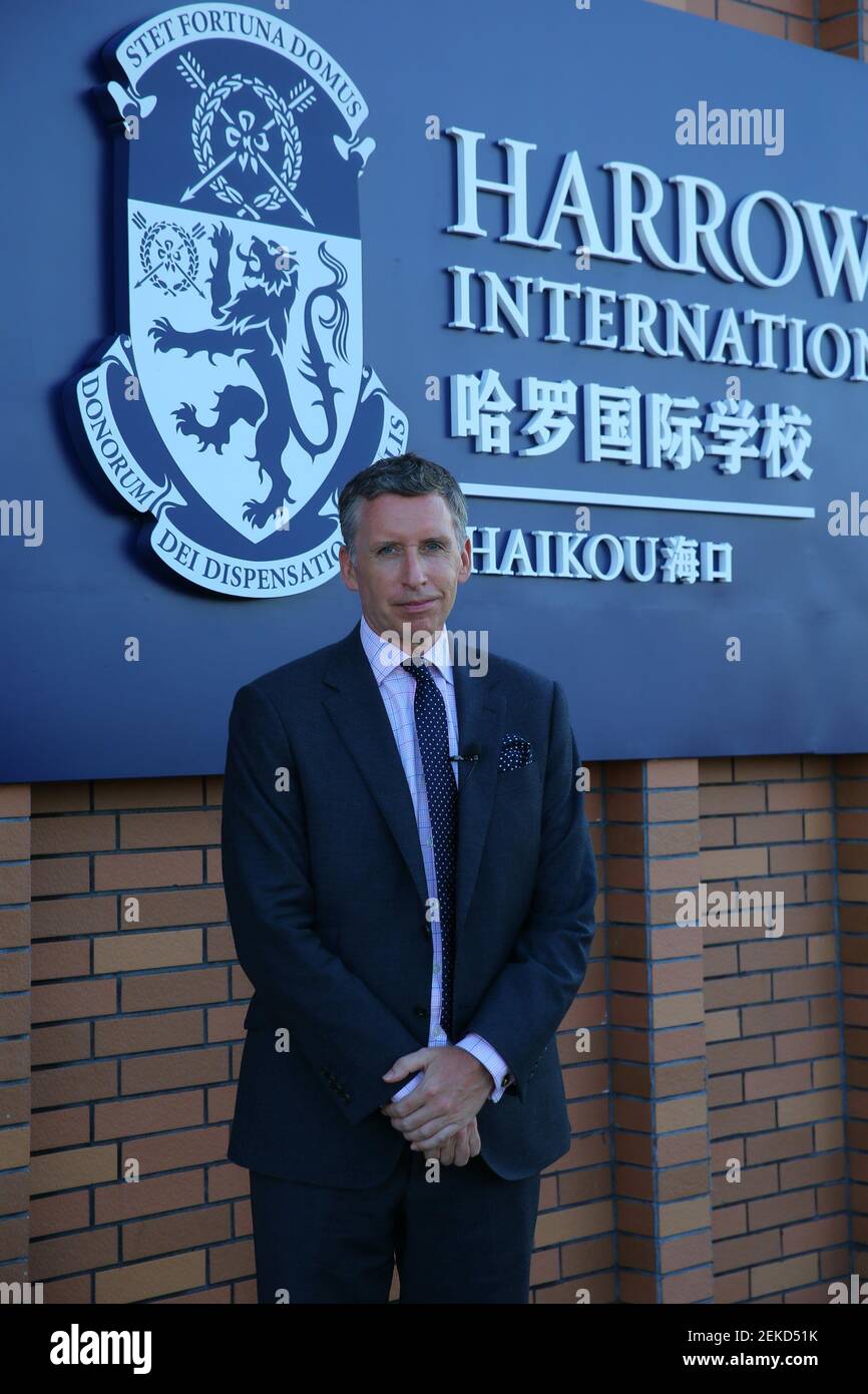 Charles Ellison, the head master of Harrow Shanghai, arrives at and ...