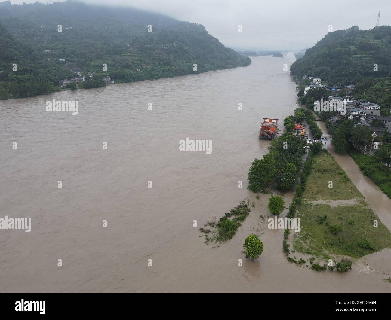 An aerial view of water level rising as the flood peak, which is caused ...