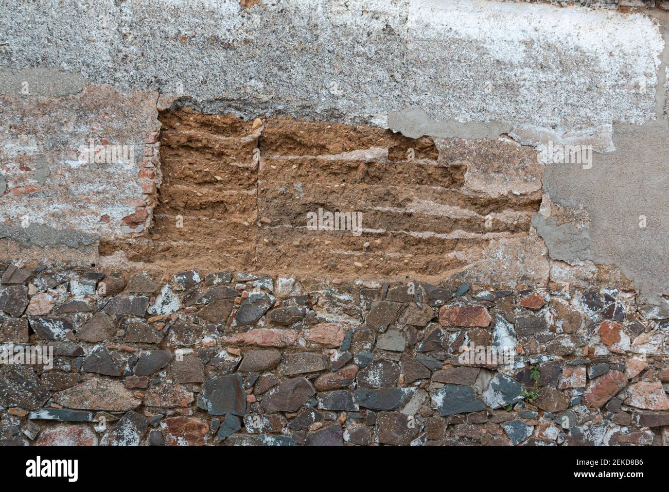 old stone wall collapsing in southern spain Stock Photo - Alamy