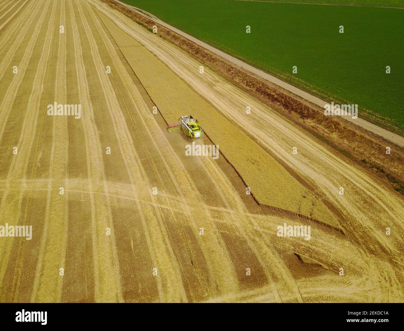 Aerial shot working agricultural harvester hi-res stock photography and ...