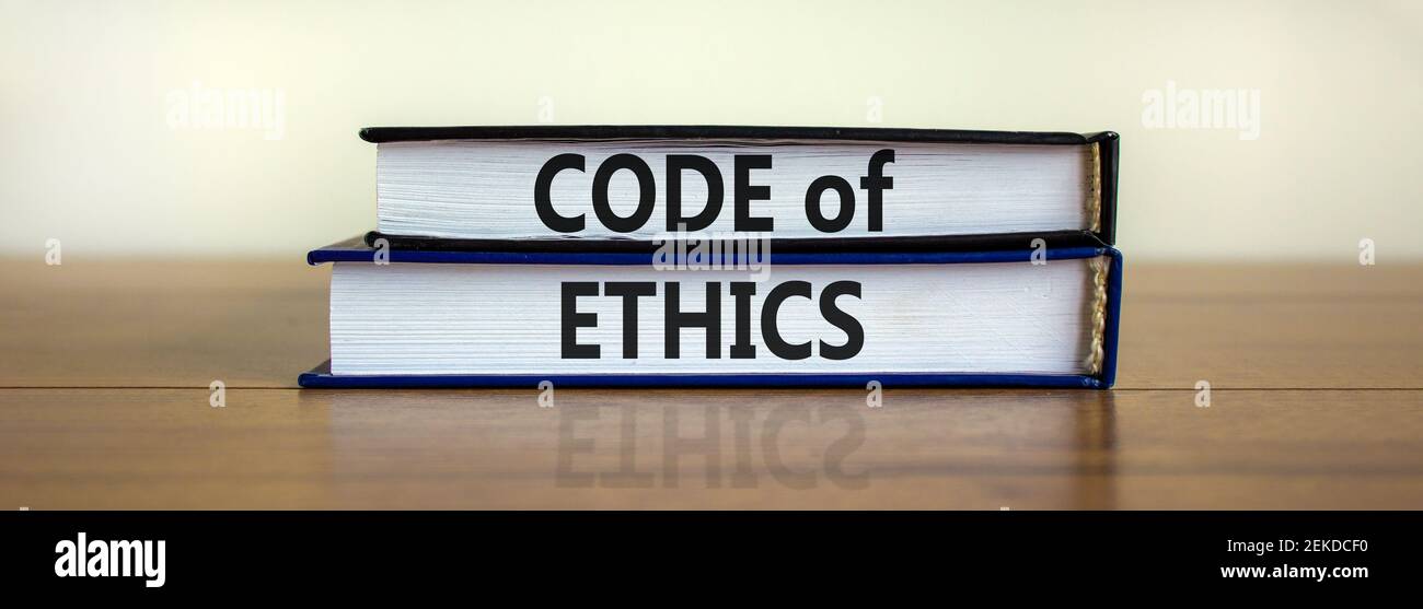 Code of ethics symbol. Concept words 'Code of ethics' on books on a ...
