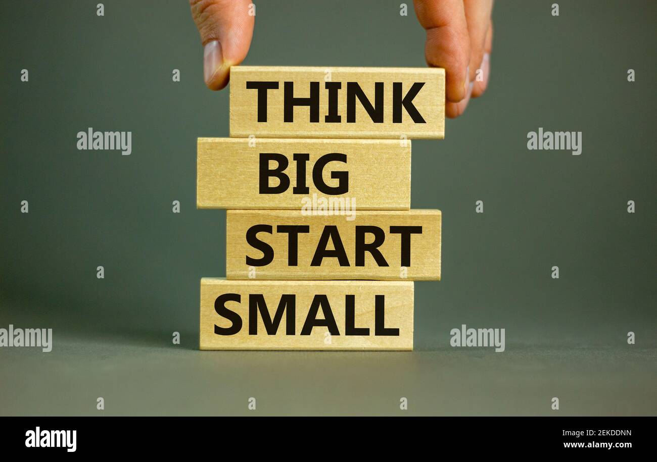 Think big start small symbol. Concept words 'Think big start small' on ...
