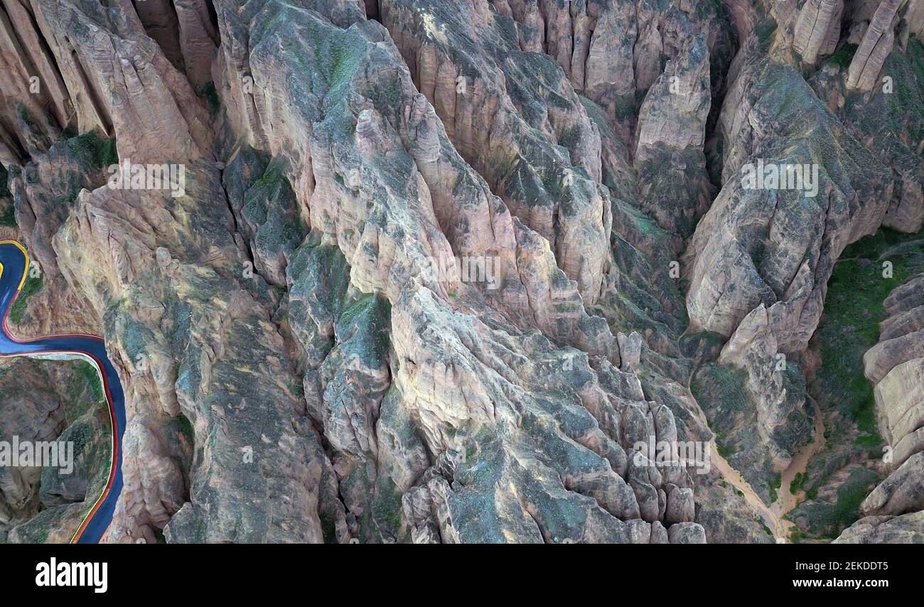 Aerial view of the cliff road with 22 turns at the Yellow River Hoodoo ...