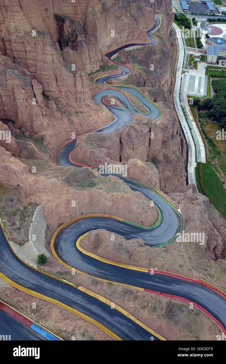 Aerial view of the cliff road with 22 turns at the Yellow River Hoodoo ...