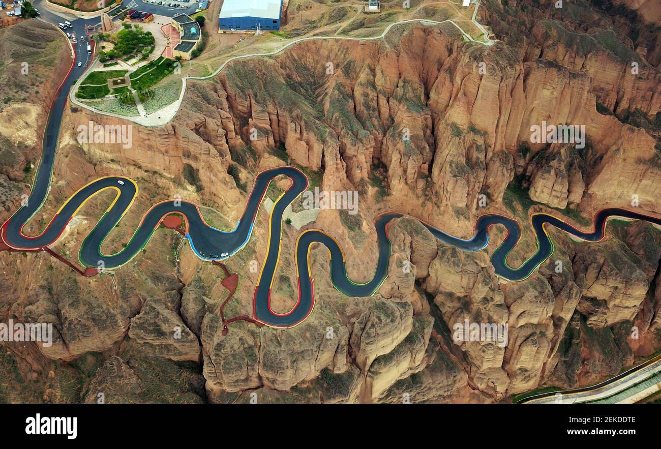 Aerial view of the cliff road with 22 turns at the Yellow River Hoodoo ...