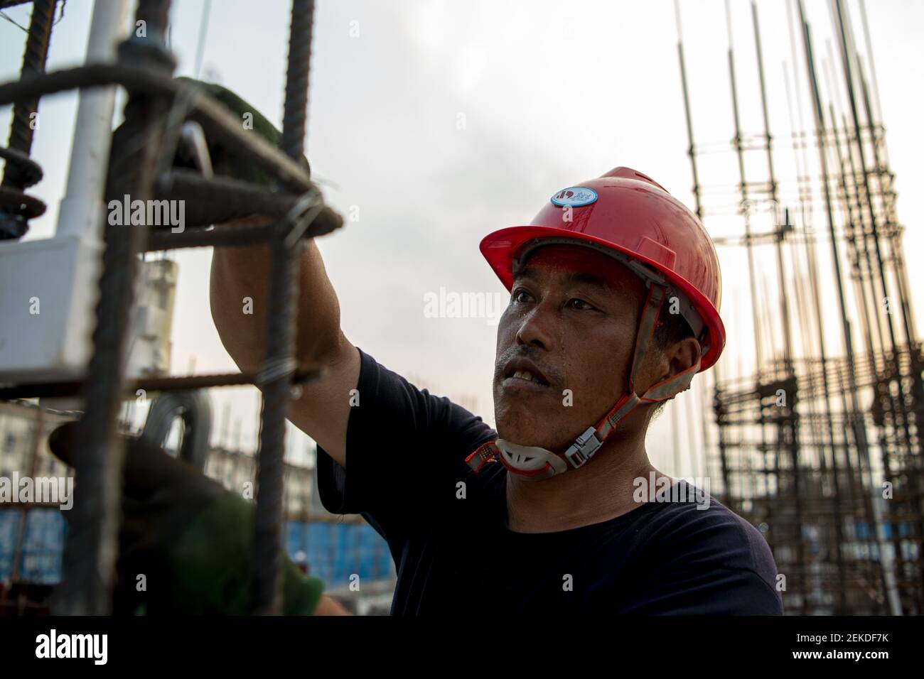 HAIAN, CHINA - AUGUST 15, 2020 - A construction worker labored on a ...