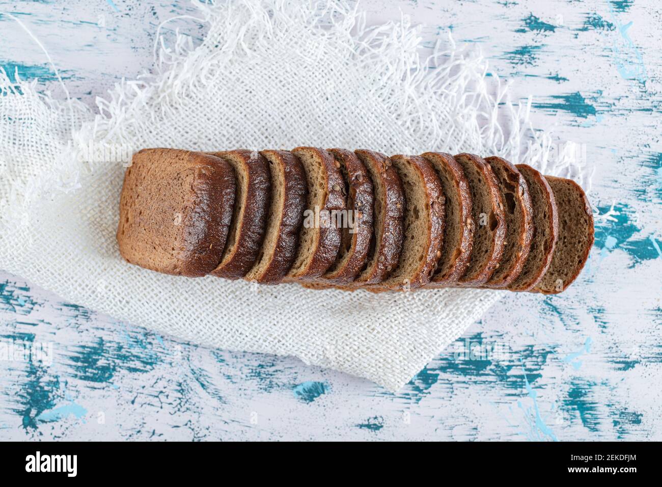 Black rye bread on the wooden desk Stock Photo - Alamy