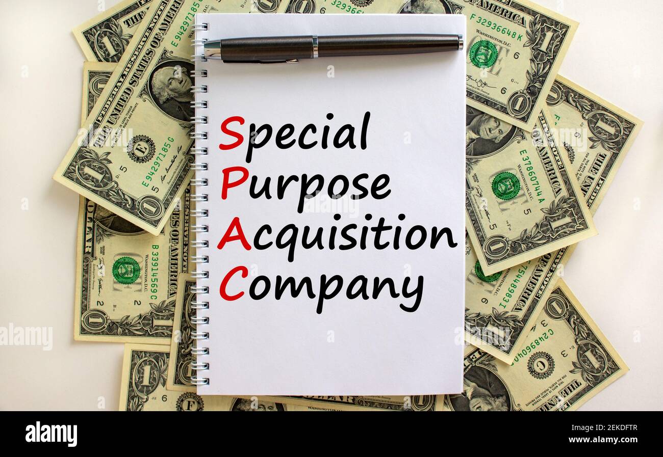 SPAC, special purpose acquisition company symbol. White note, words ...