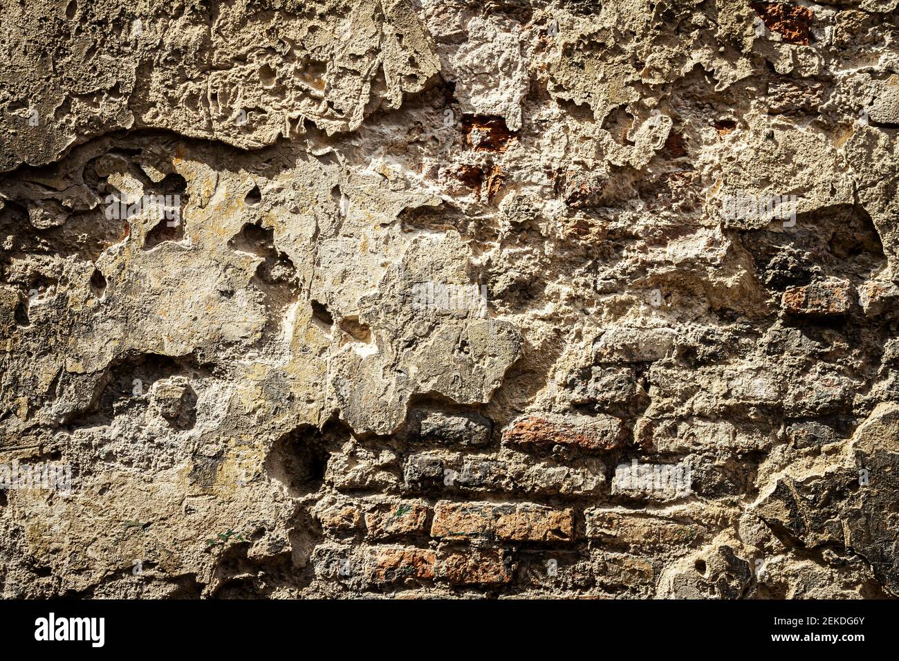 Old brick and plaster wall texture background. Painted distressed wall ...