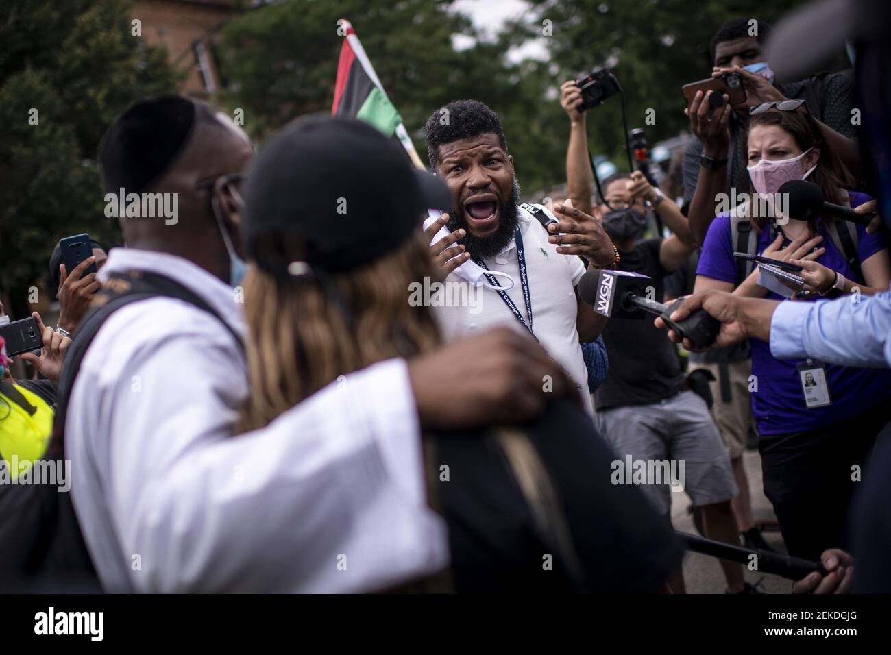 Black Lives Matter activists argue during a march through Chicago’s ...