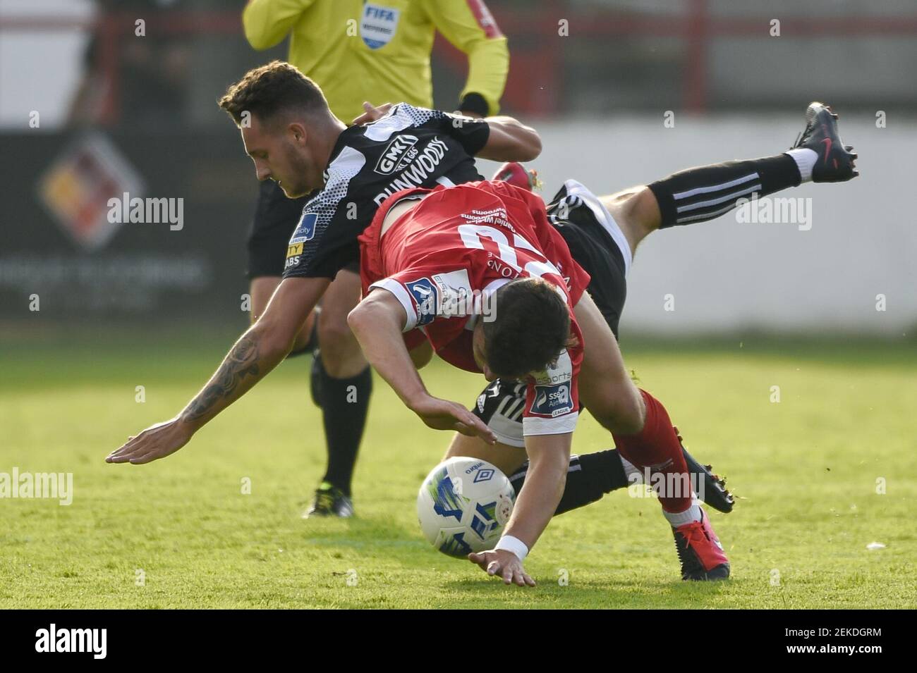 Aaron Dobbs of Shelbourne fights for the ball with Jake Dunwoody of ...