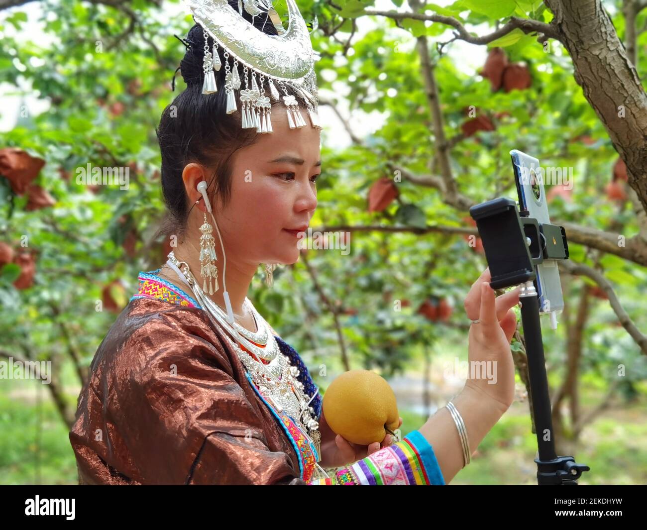 JINPING, CHINA - AUGSUT 15, 2020 - A anchor sells the local specialty ...