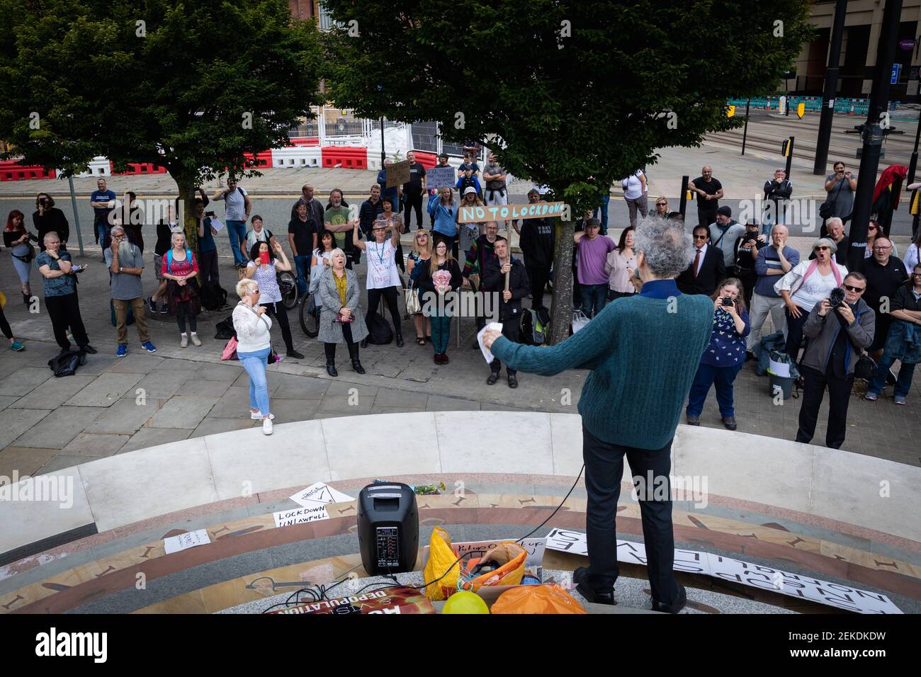 Piers Corbyn speaks to protesters at the Peterloo Massacre memorial ...