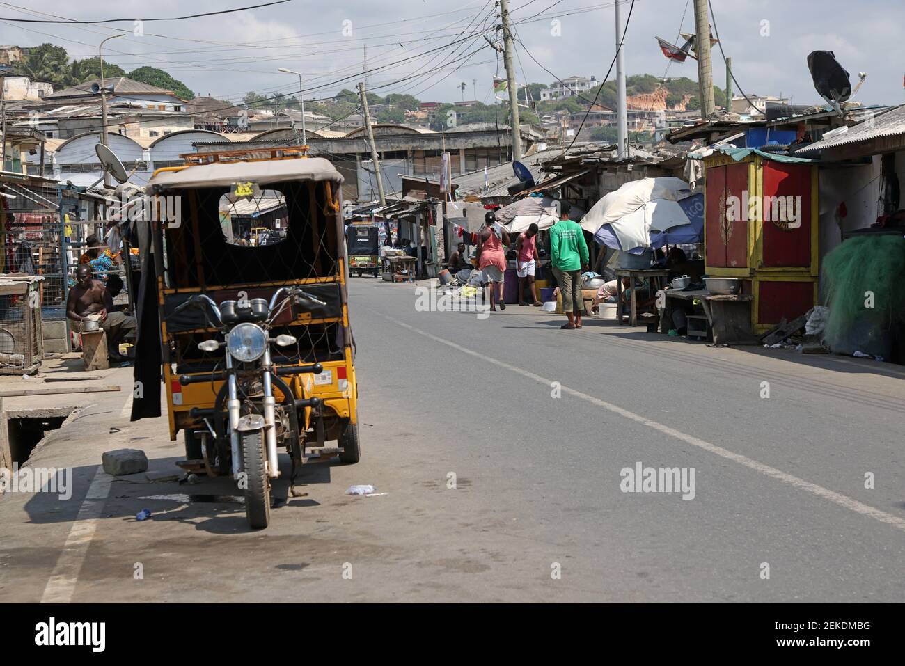 Cape Coast Ghana poverty city streets Africa. Urban traffic in ...