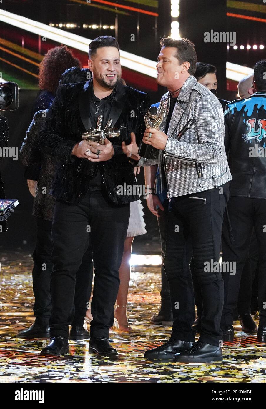 MIAMI, FL - AUGUST 16: Sammy Colon and Carlos Vives are seen with the ...