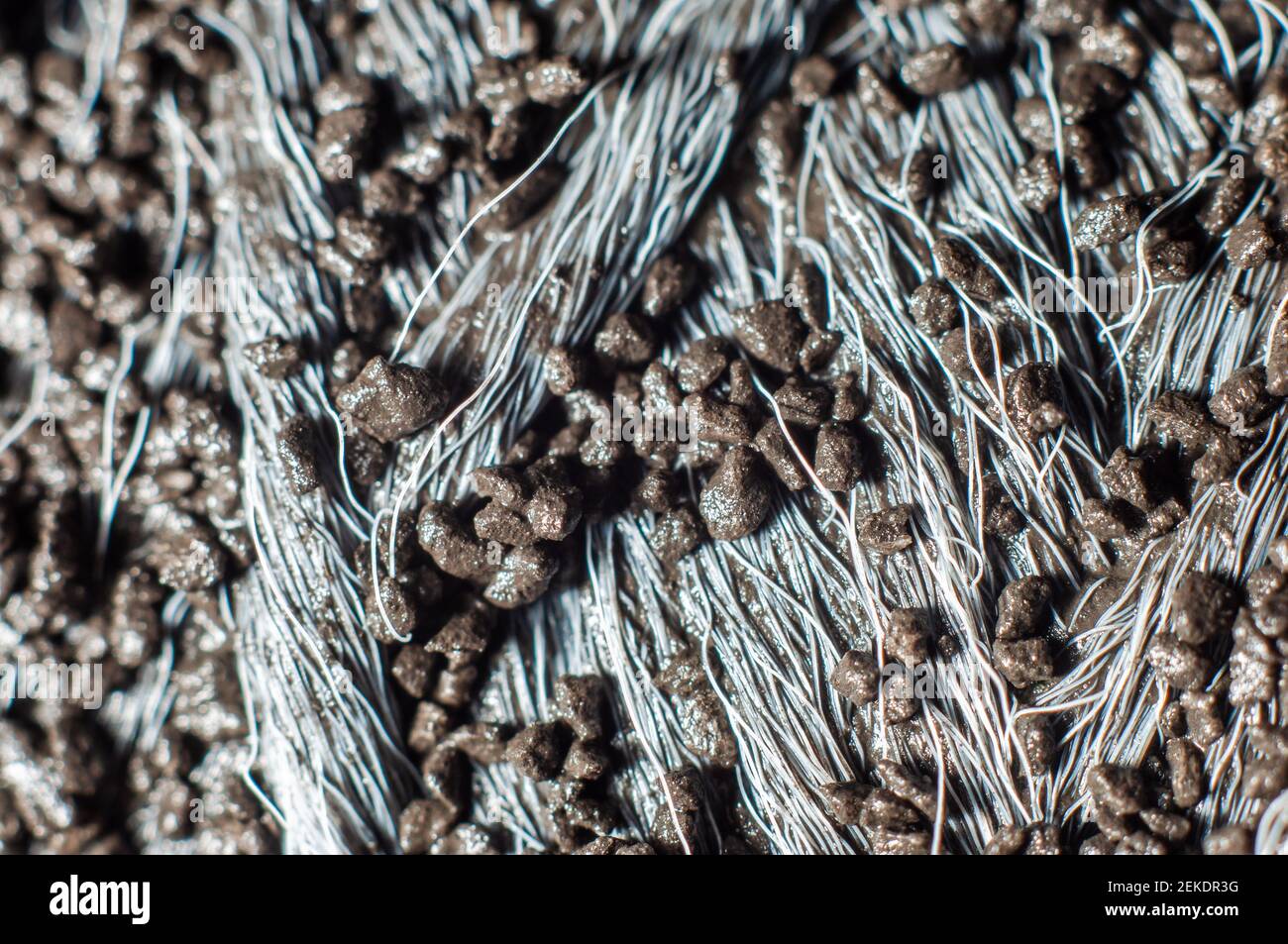 Polypropylene thread in a water purification filter to retain granular ...
