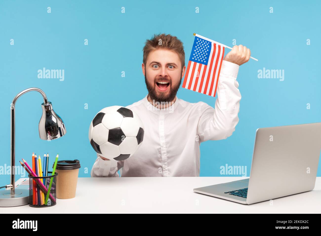 Excited bearded man football fan holding united states of america flag ...
