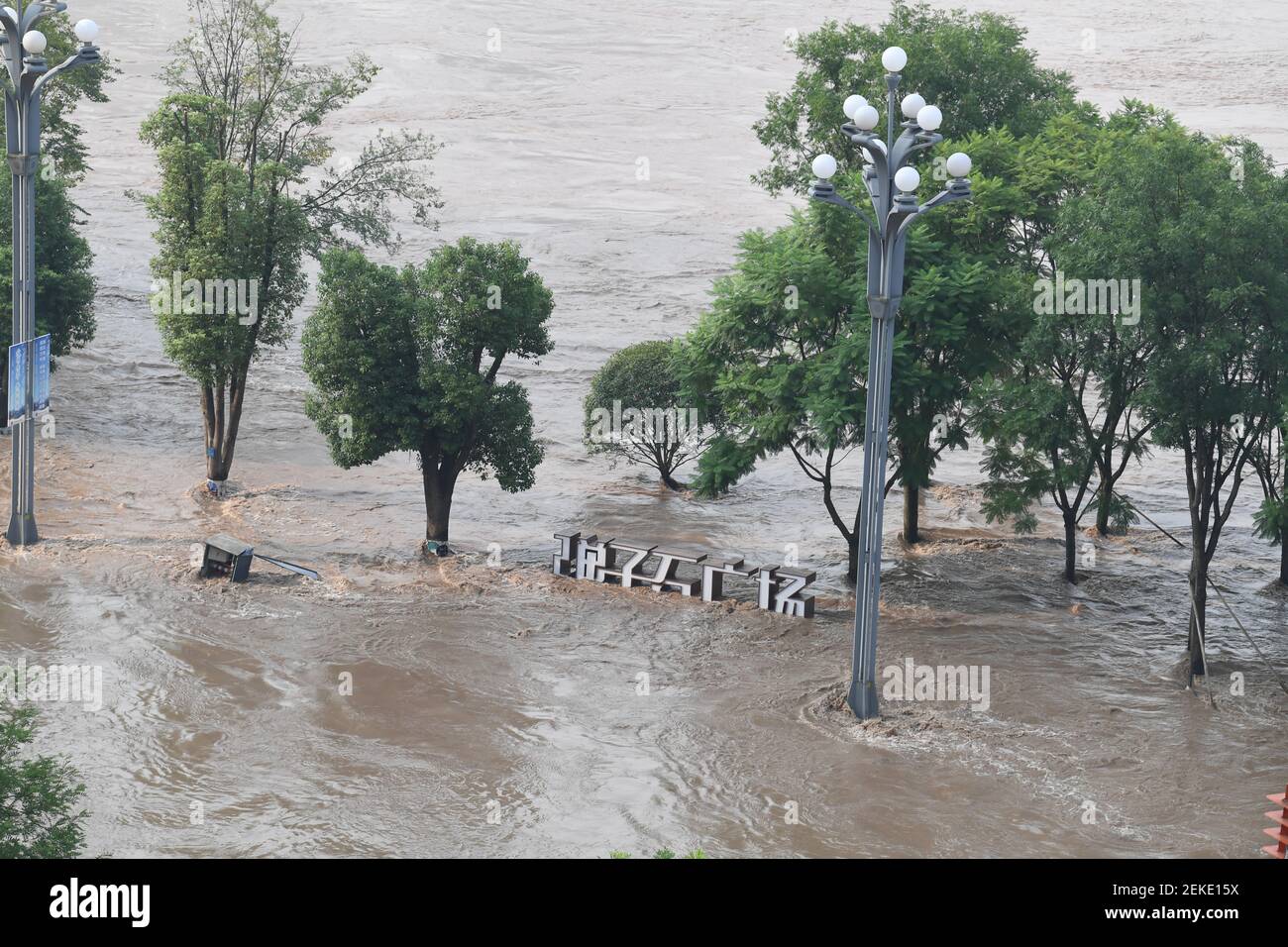 The logo of Changjiahui Plaza is submerged by flood in Chongqing, China ...