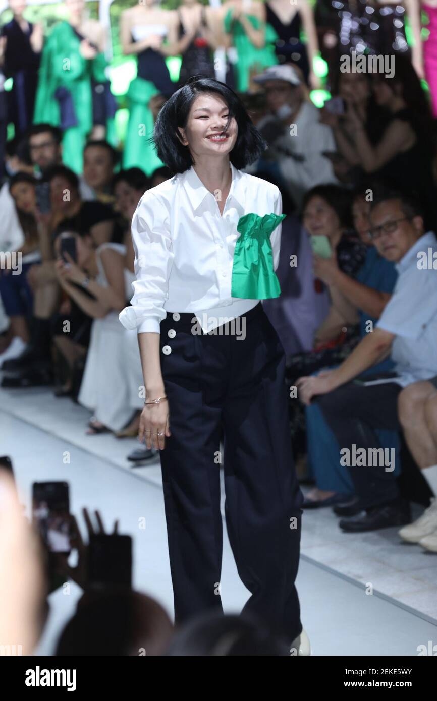 Chinese fashion designer, supermodel, and actress Lv Yan, stands for ...