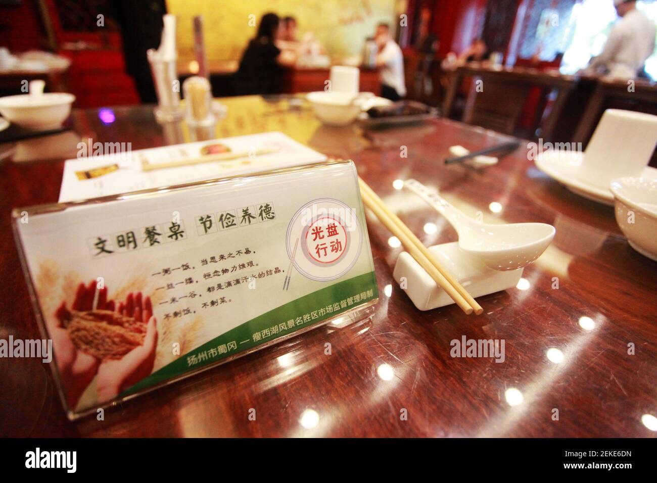 Staff at a local restaurant put up signs with characters saying "Clean ...