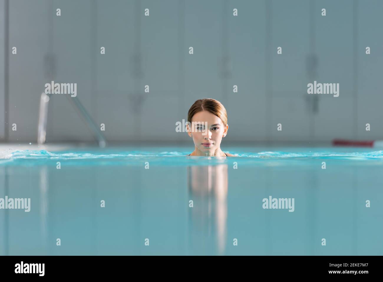 Pretty woman swim in pool hi-res stock photography and images - Alamy