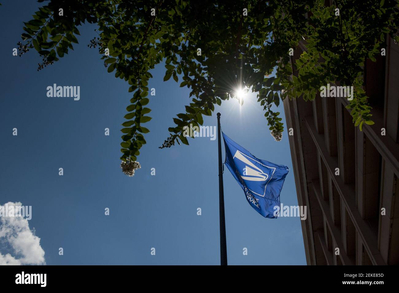 The USPS flag flies outside of the United States Postal Service ...