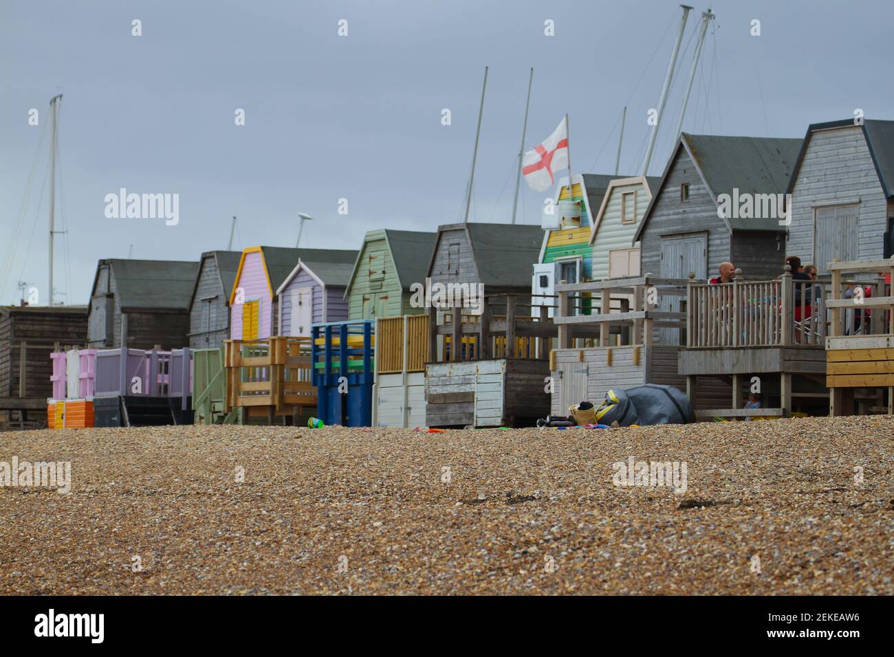 People seen on beach hut at the pebble beach in Whitstable in the east ...