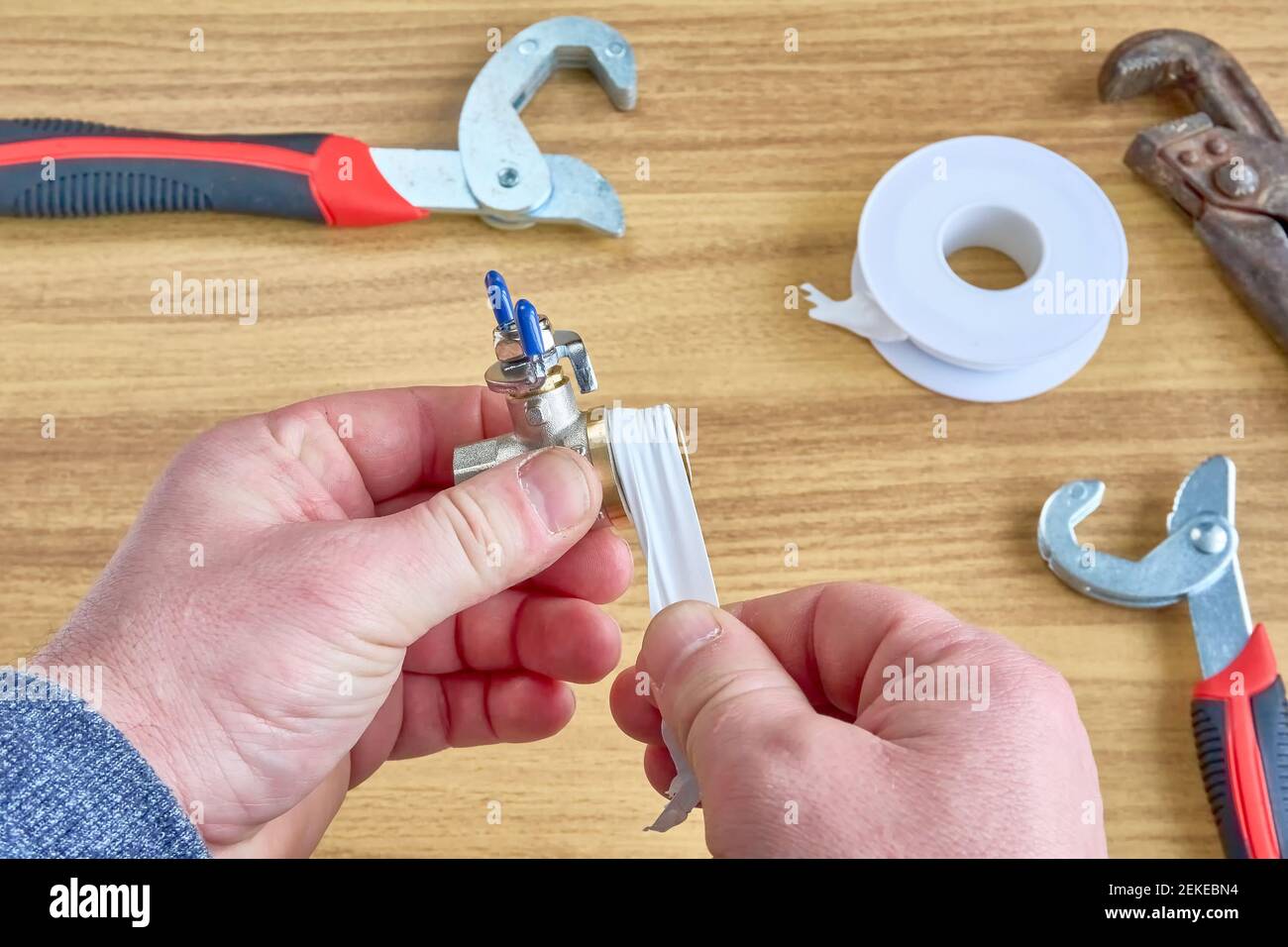 DIY repair, keys, tape reel hose ball valve Stock Photo - Alamy