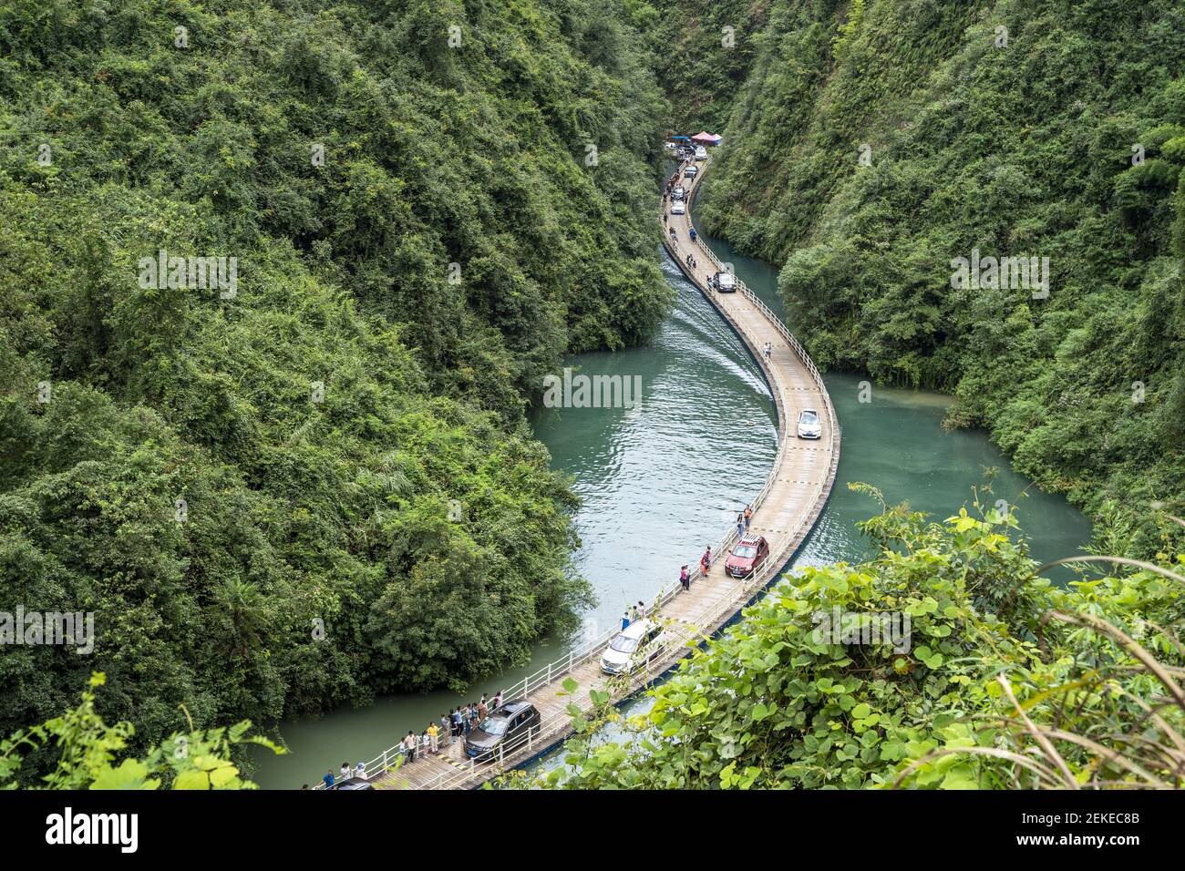 Aerial view of people walking on a float bridge at Shiziguan Village in ...