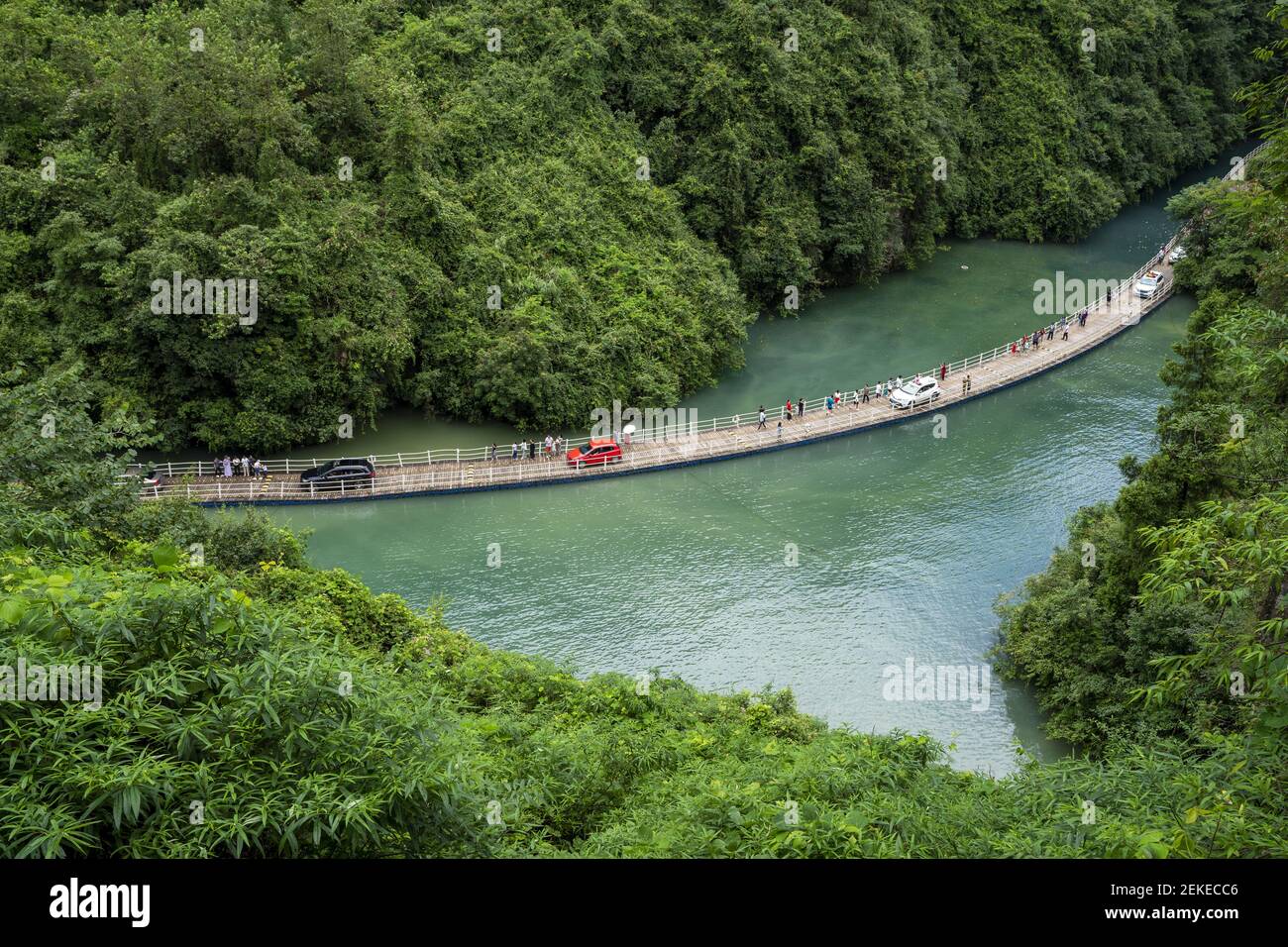 Aerial view of people walking on a float bridge at Shiziguan Village in ...