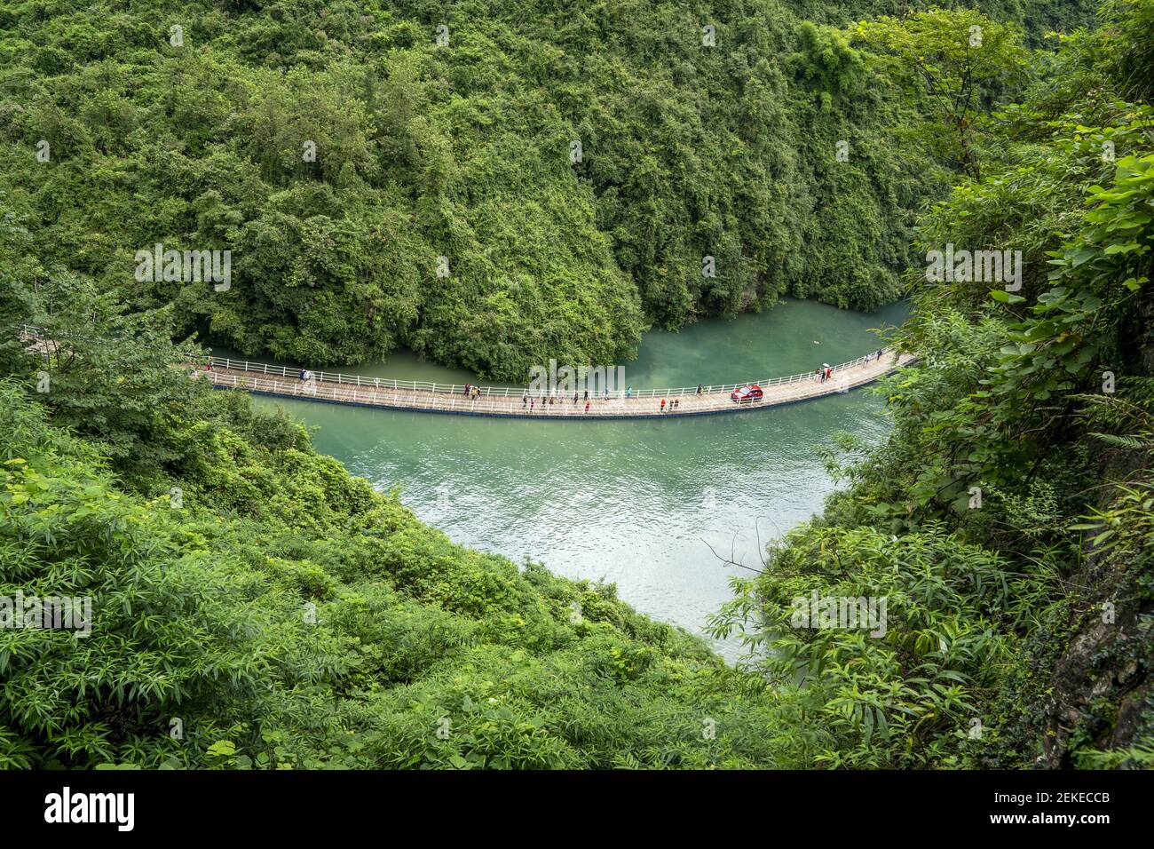 Aerial view of people walking on a float bridge at Shiziguan Village in ...