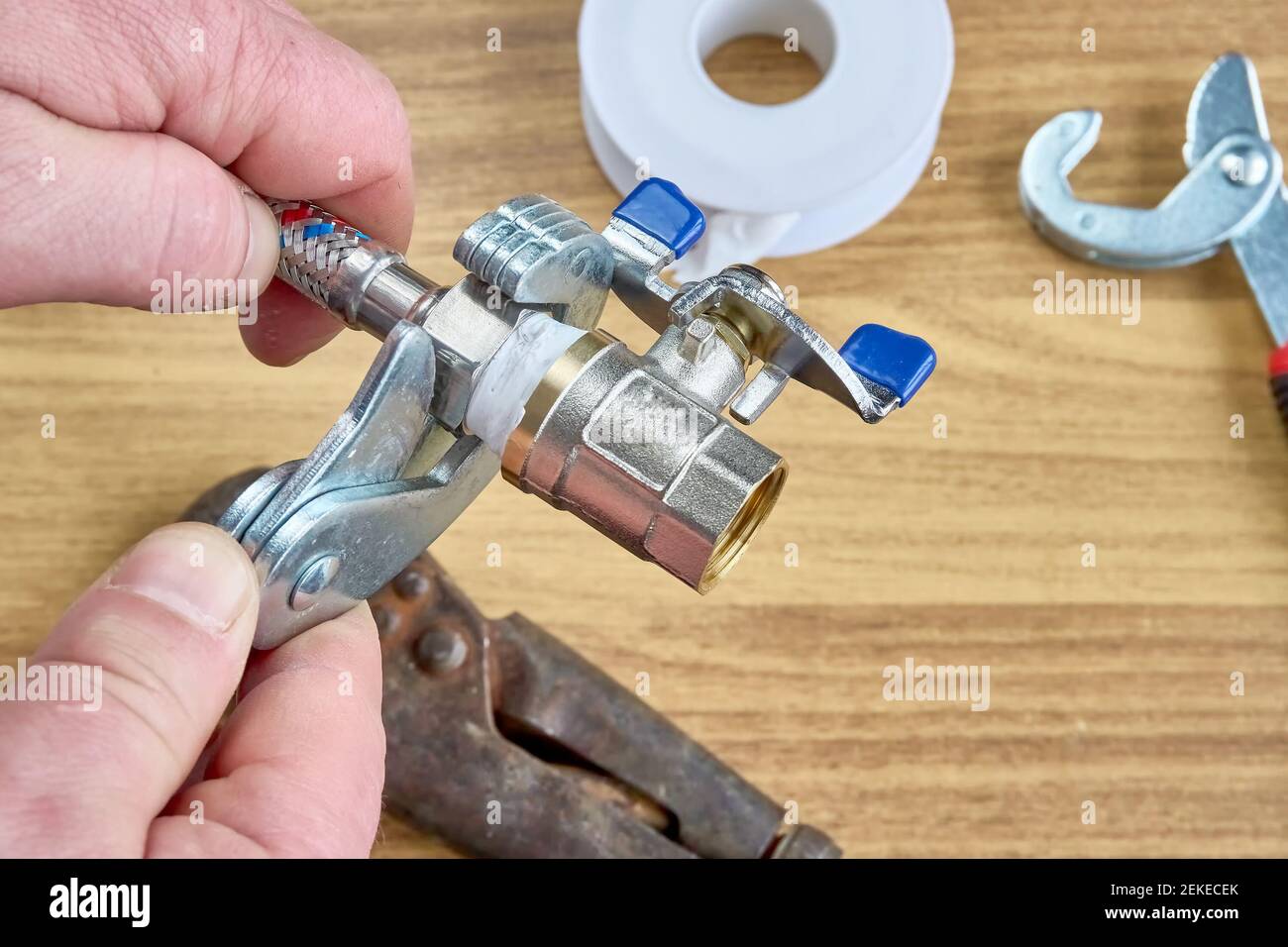 DIY repair, keys, tape reel hose ball valve Stock Photo - Alamy