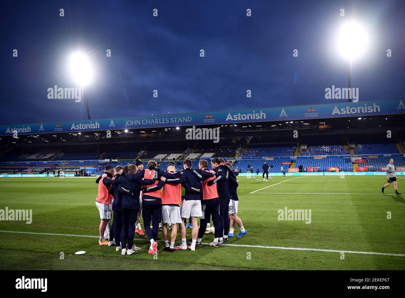 Leeds United players have a team huddle on the pitch before the Premier ...