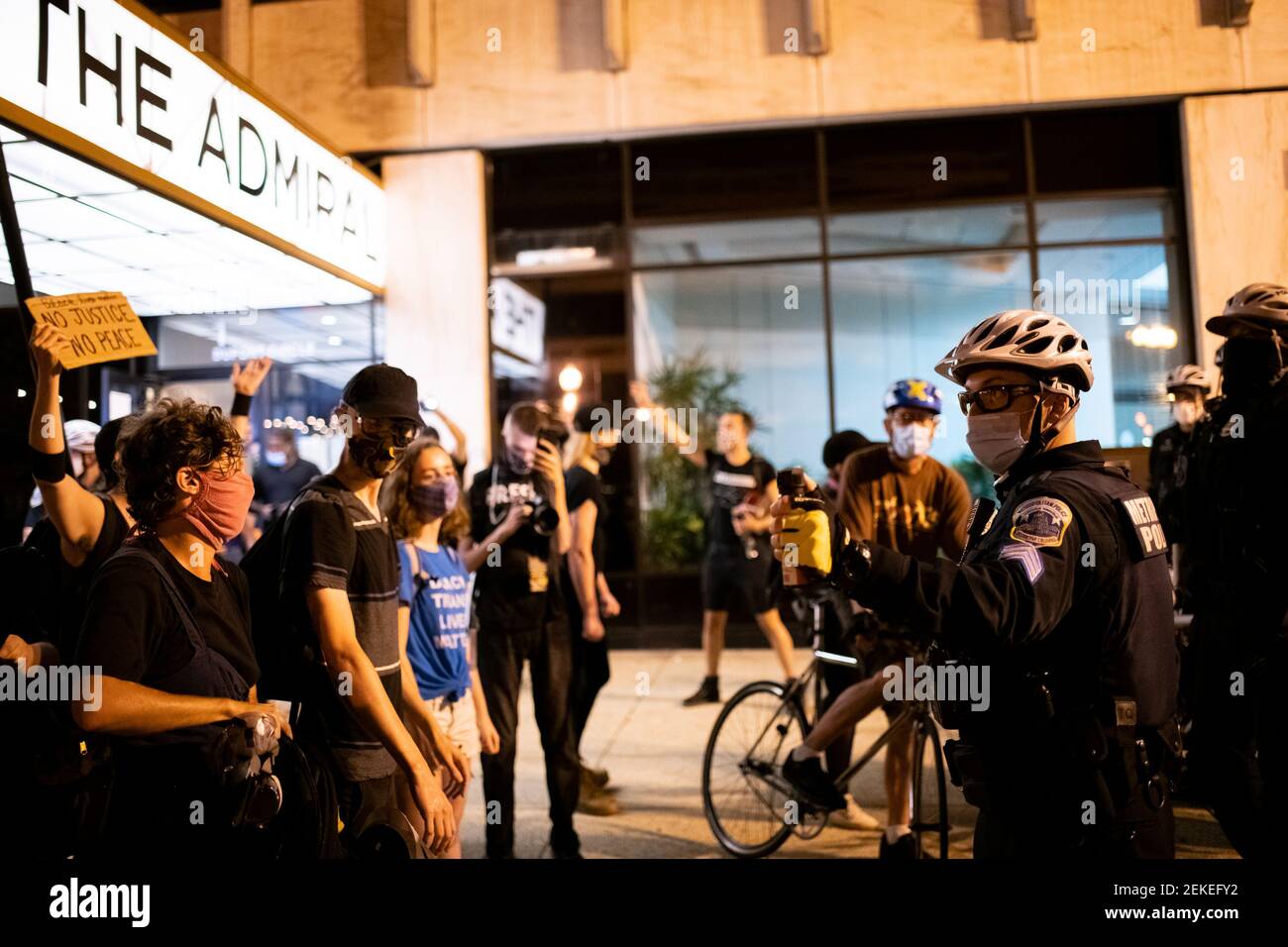 Police threaten to pepper spray demonstrators and media after an angry ...