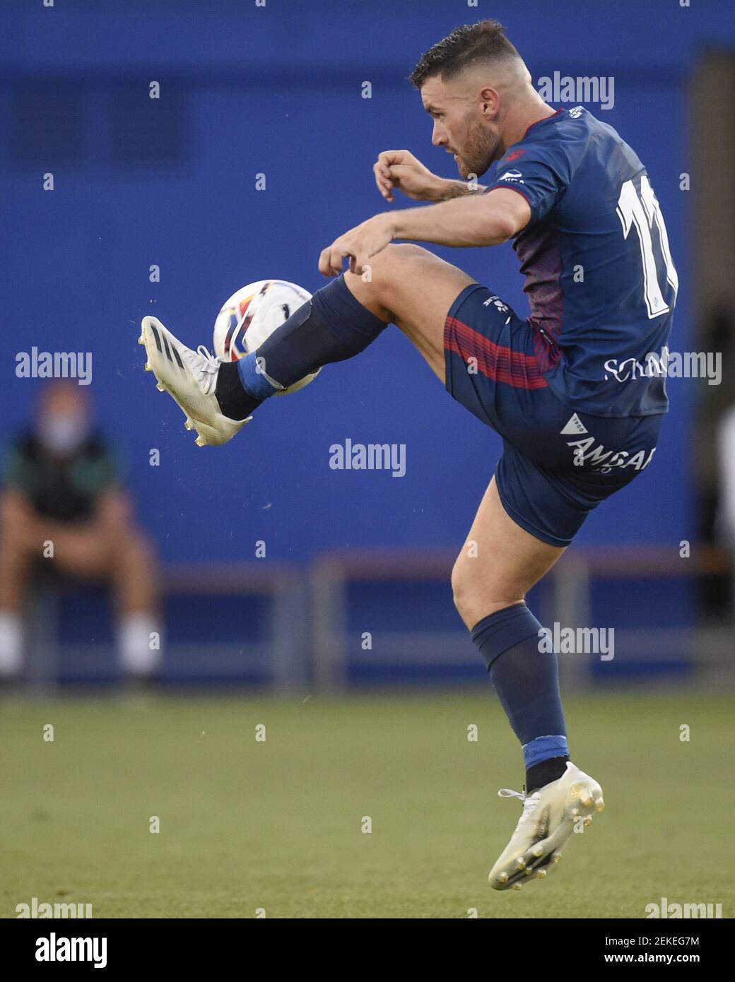 Javi Galan of SD Huesca controls the ball in the air during the pre ...