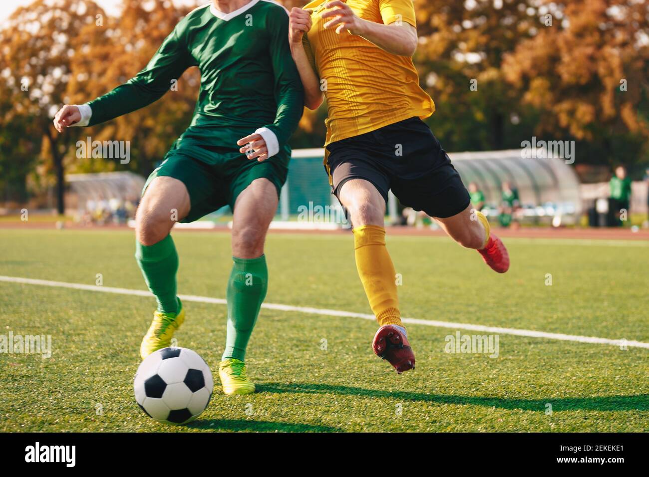 Two soccer players running ball hi-res stock photography and images - Alamy