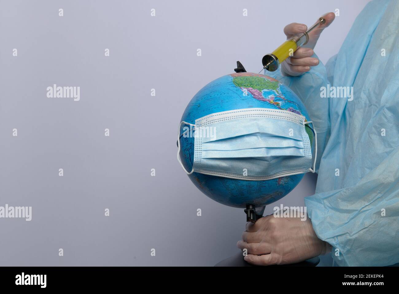Doctor gives syringe vaccine hi-res stock photography and images - Alamy