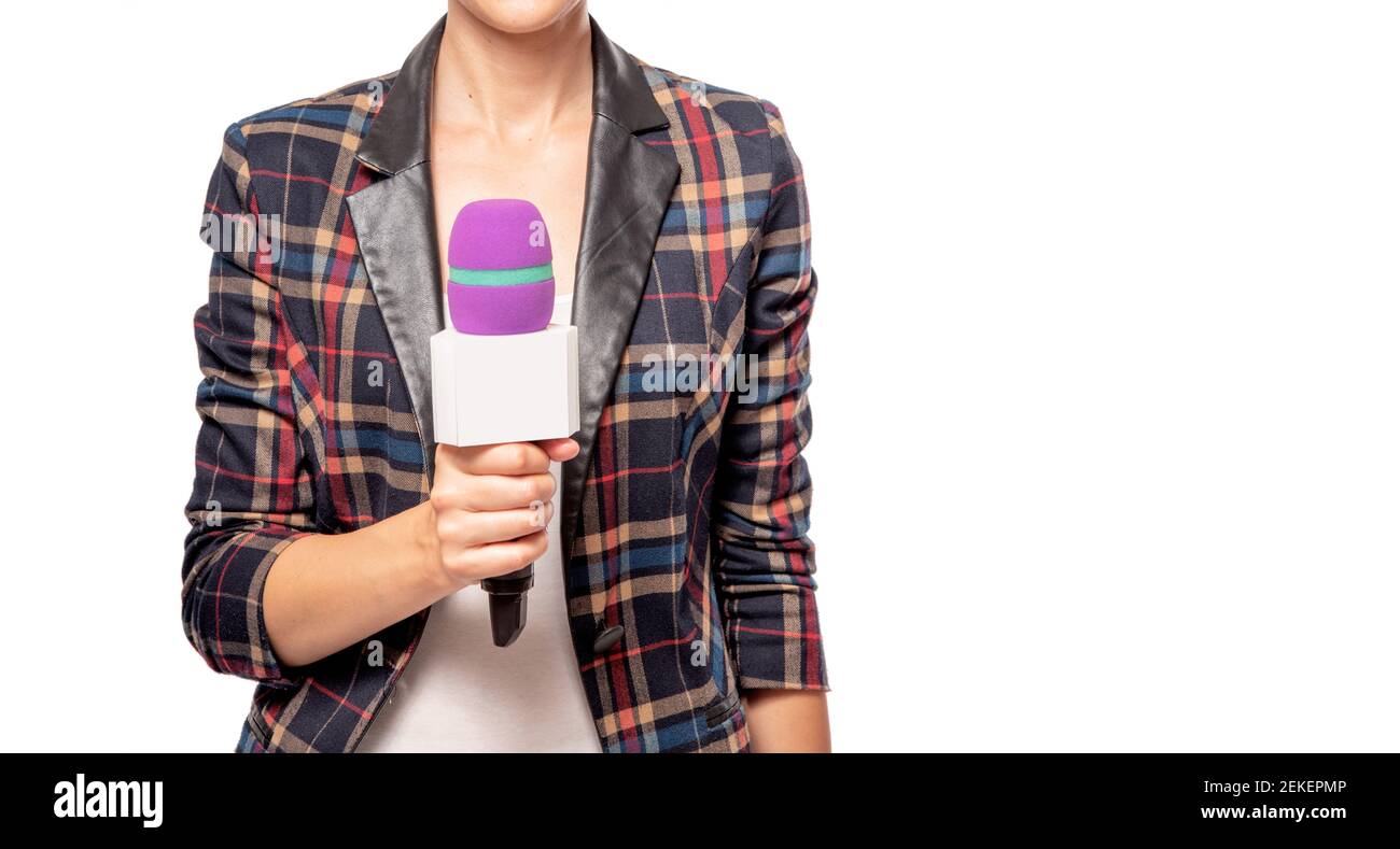 Young tv reporter with microphone hi-res stock photography and images ...