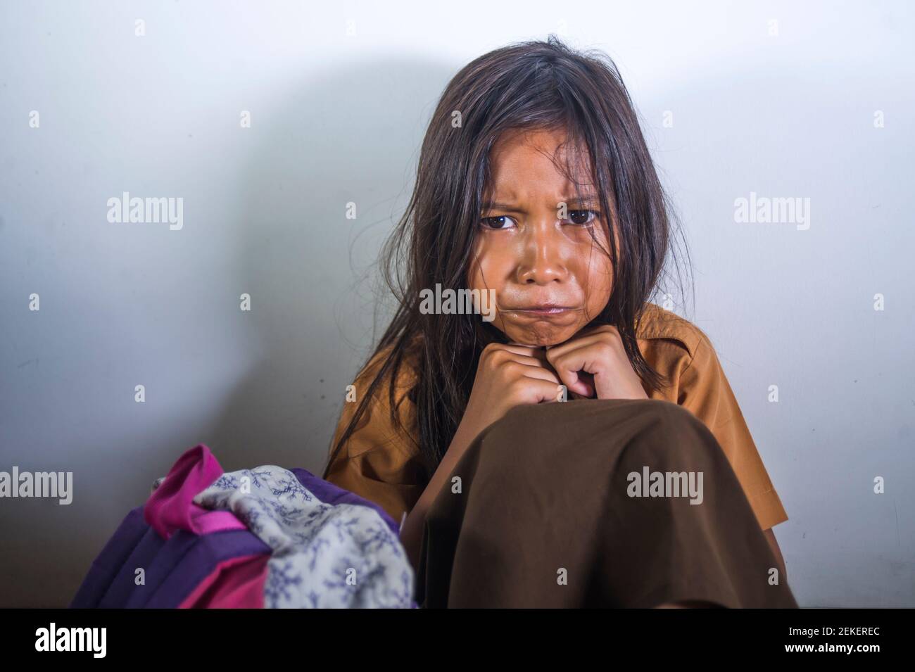 Abused girl school uniform hi-res stock photography and images - Alamy