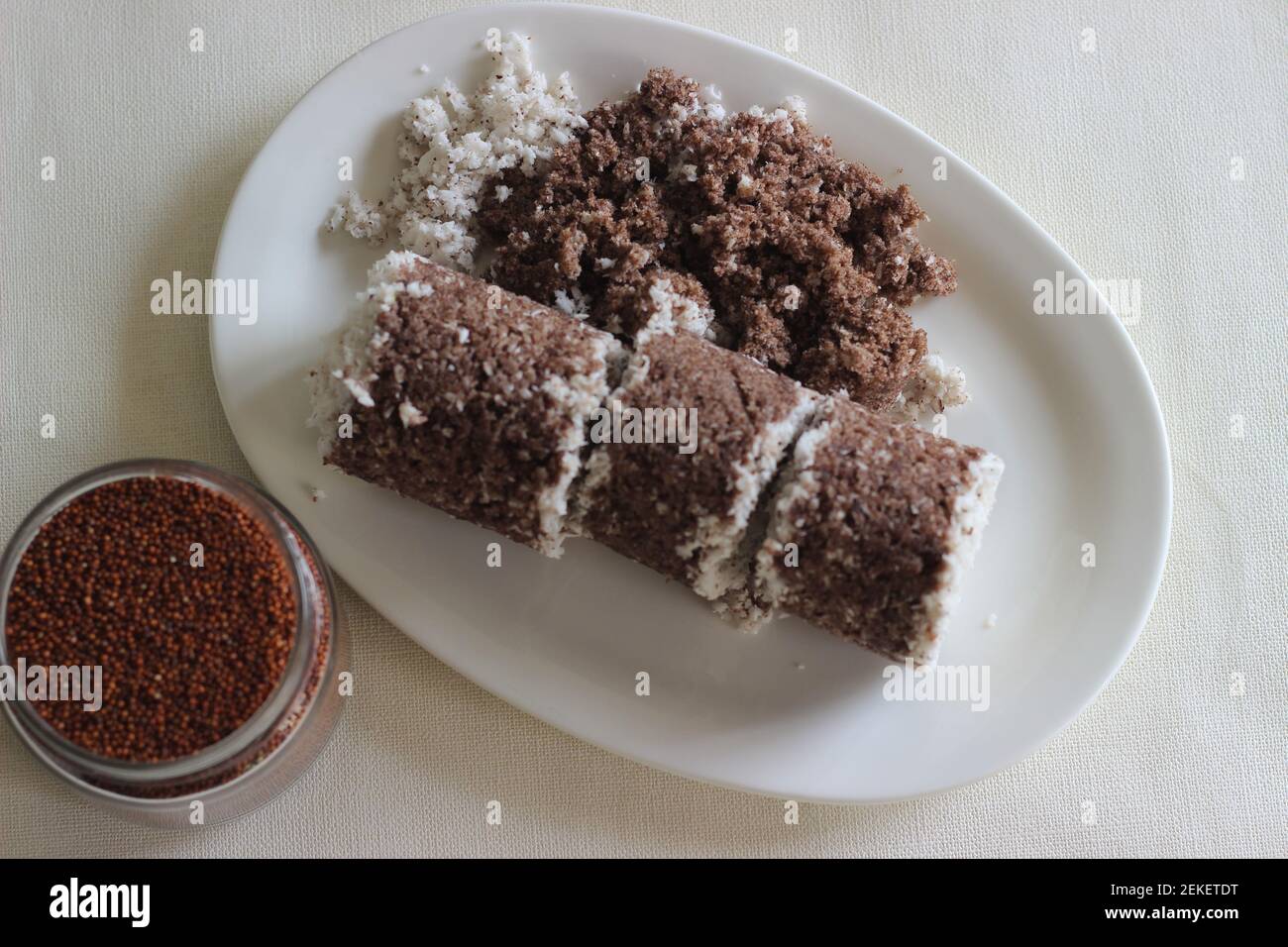 Steamed finger millet cake. Made with finger millet flour combined with ...