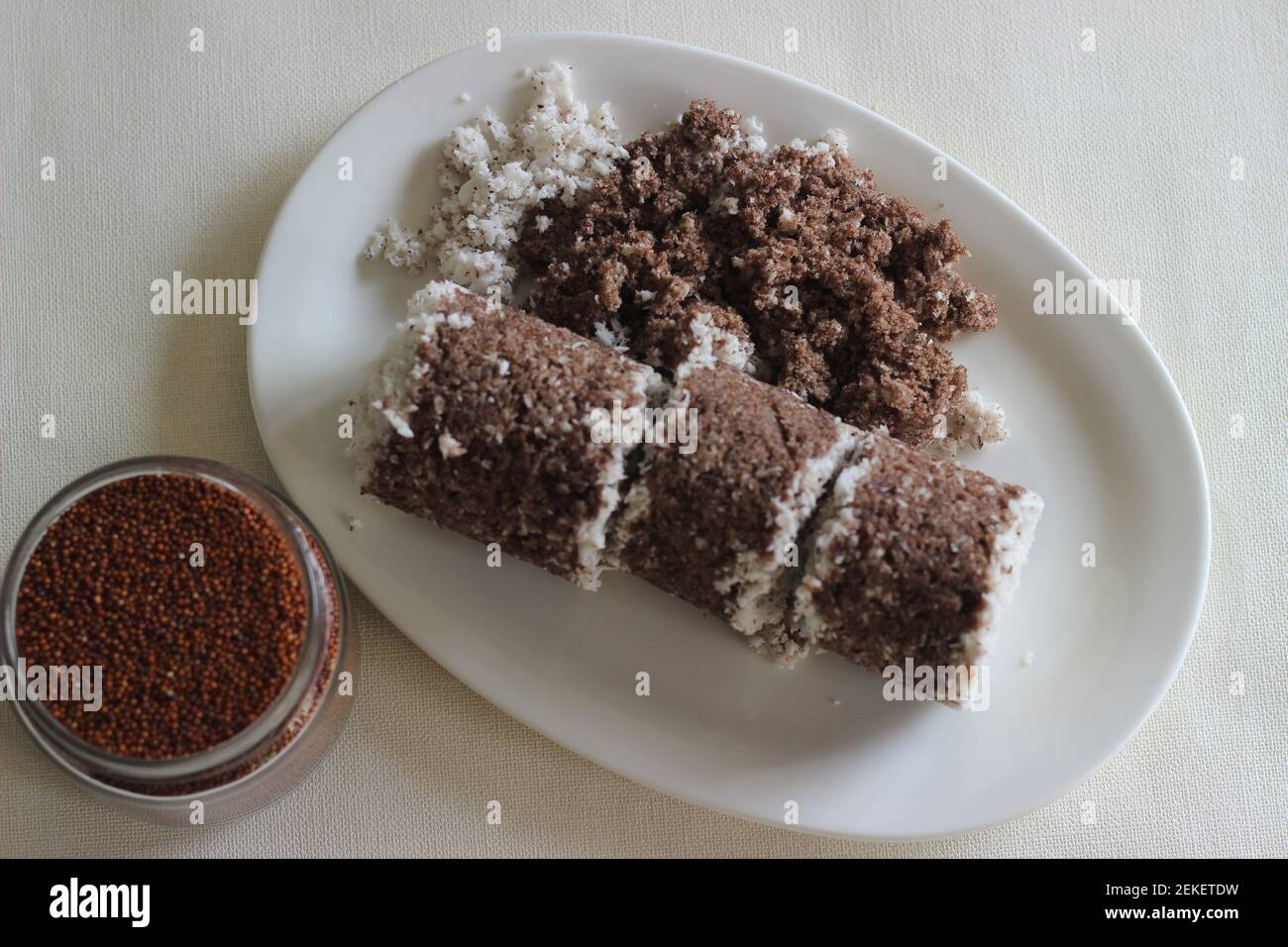 Steamed finger millet cake. Made with finger millet flour combined with ...