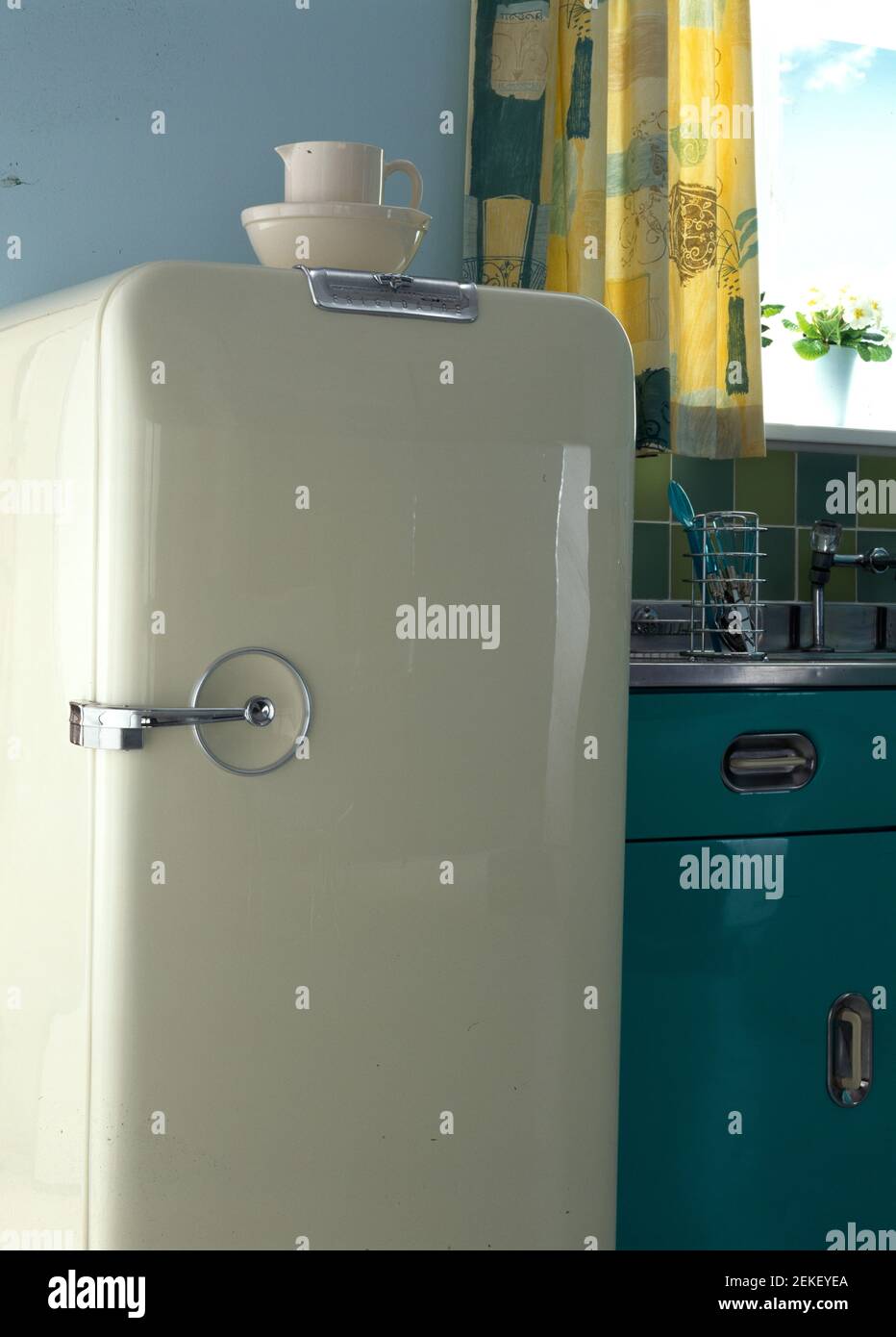 Closeup of cream thirties style fridge Stock Photo - Alamy