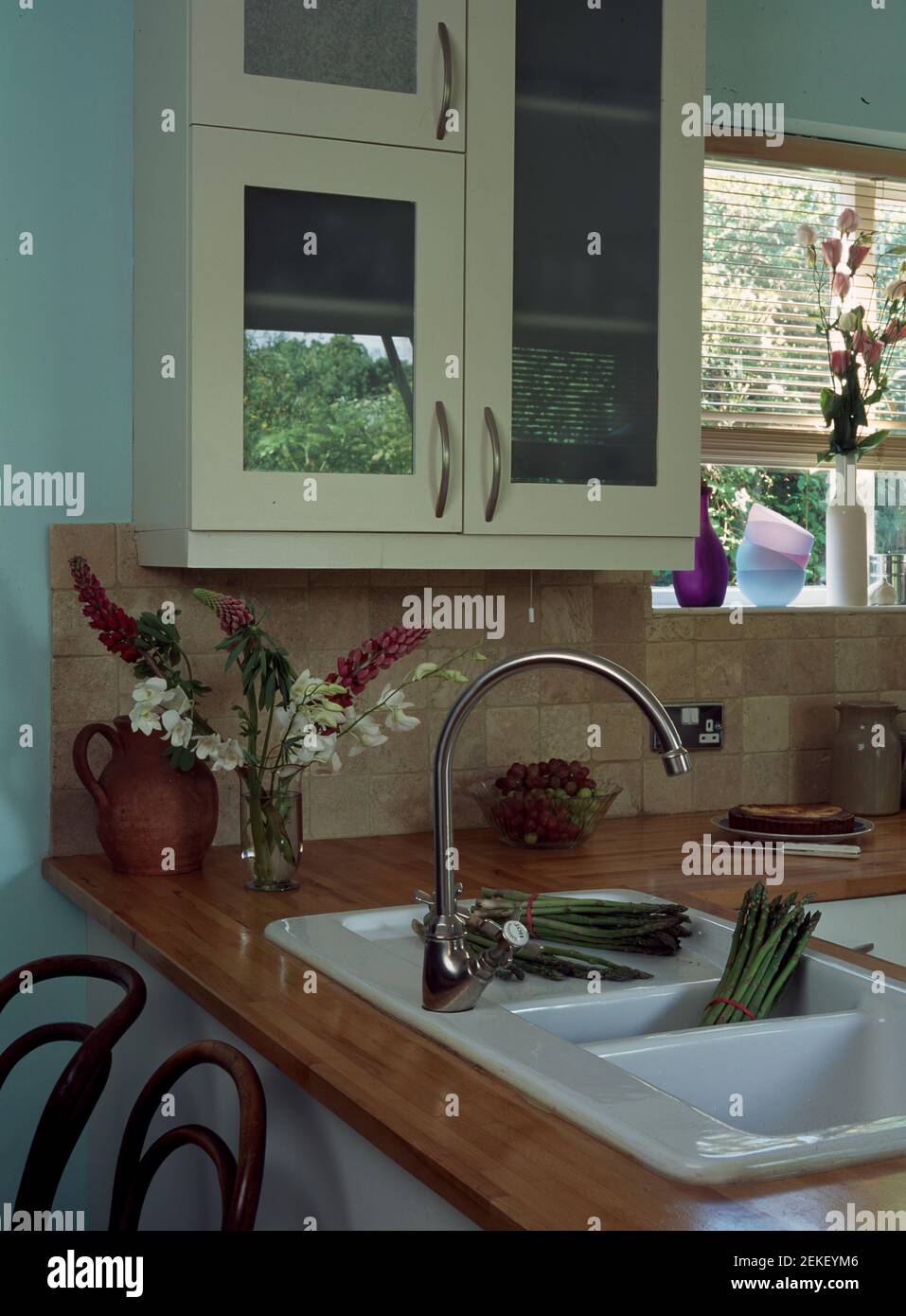 Closeup of kitchen counter with white sink Stock Photo - Alamy