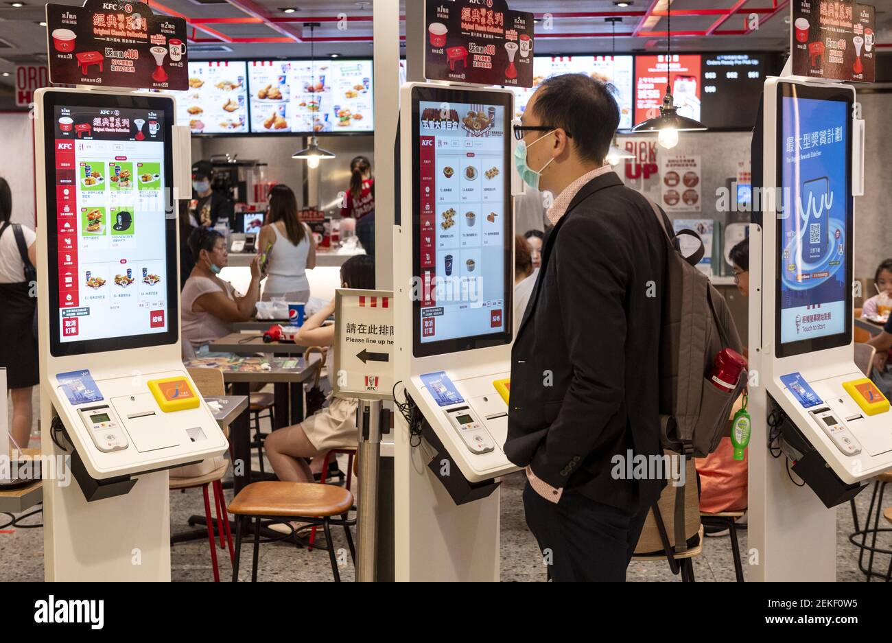 A customer orders food at the American fast food chicken restaurant ...