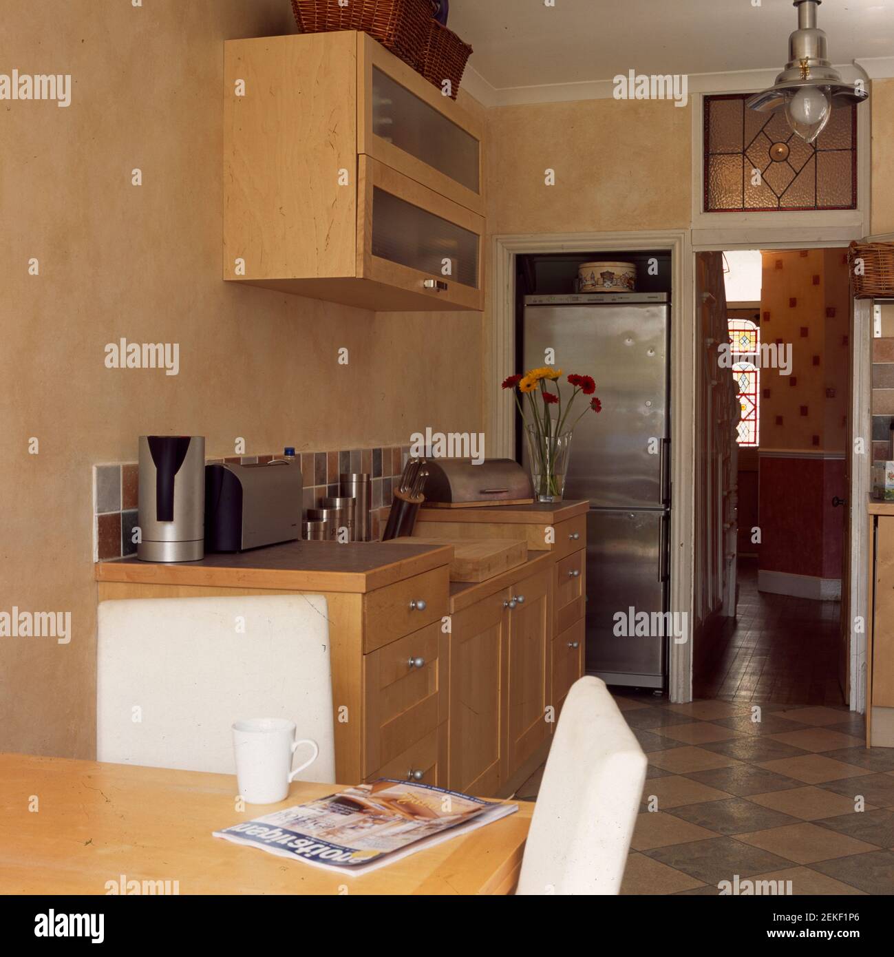 Small kitchen with wooden units Stock Photo - Alamy
