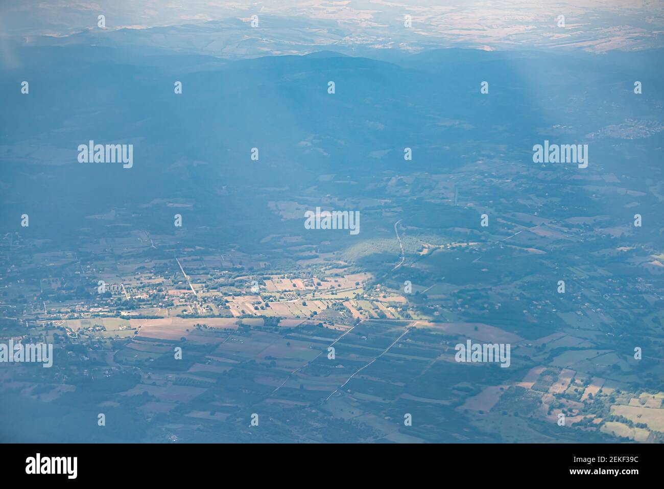 Italy aerial above high angle view from window of airplane on houses ...