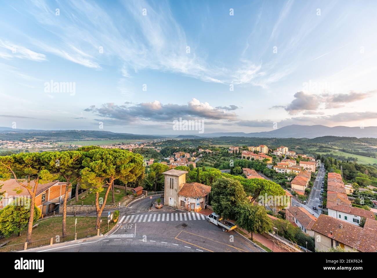 Chiusi sunset evening in Tuscany, Italy with rooftop houses on mountain ...