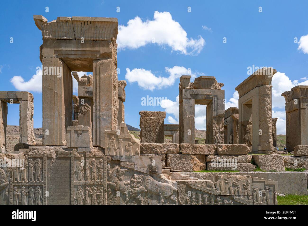 Ruins, statues and murals of ancient persian city of Persepolis in Iran ...